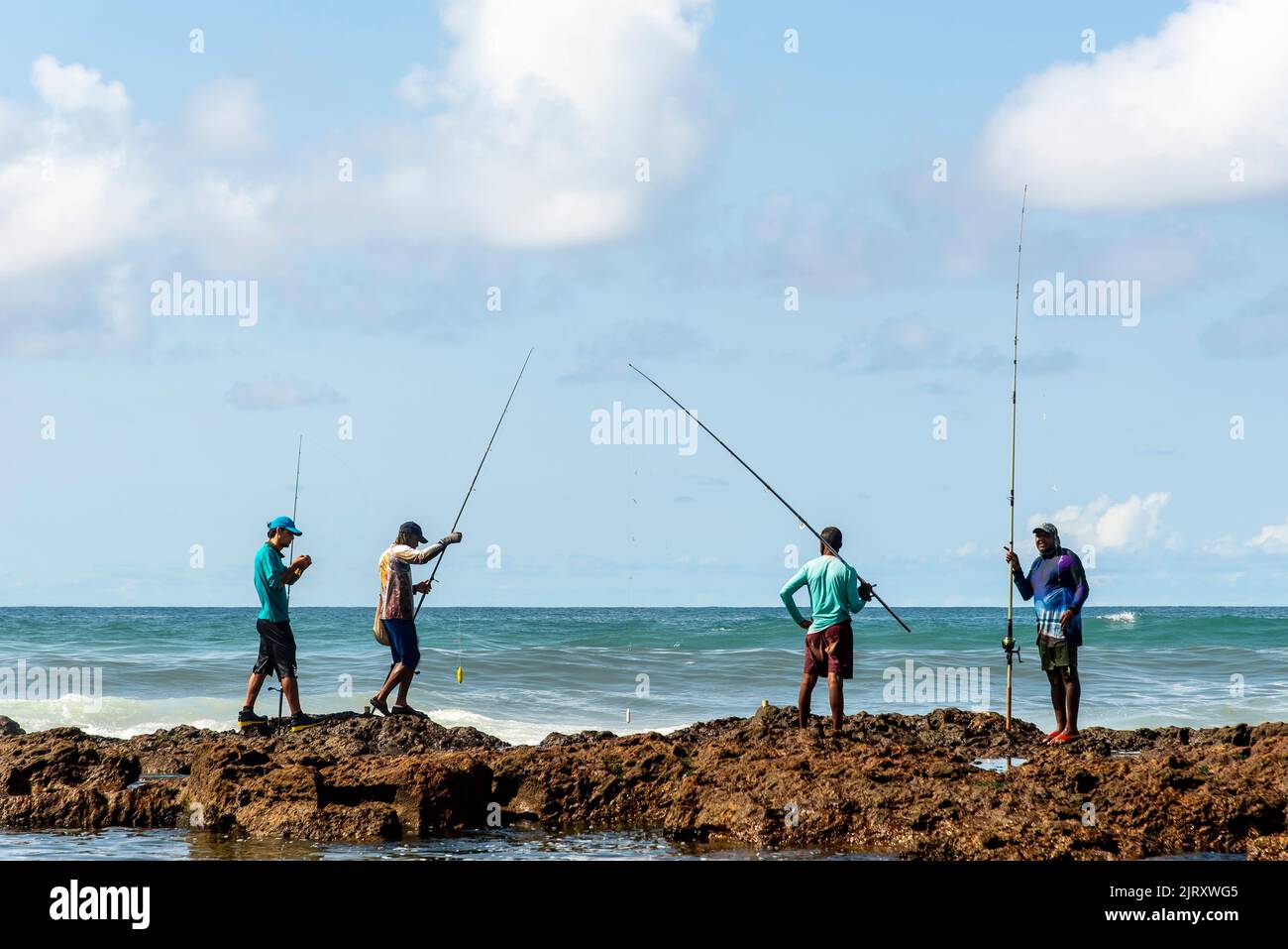 Fishermen with fishing rod on the rocks fishing on the famous Boca do ...