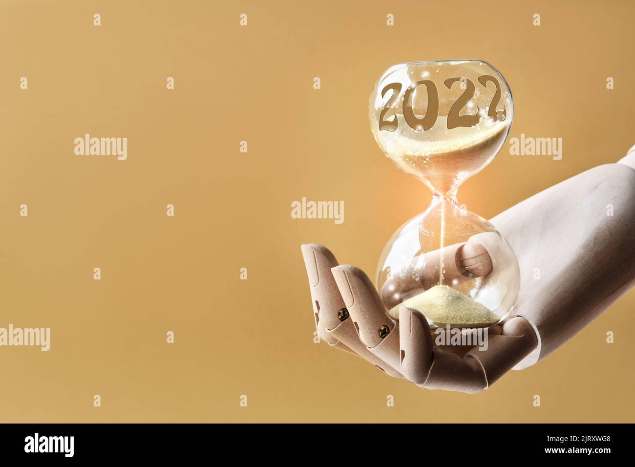 Hourglass, passage of time from 2022 to 2023 year. Wood artistic model ...