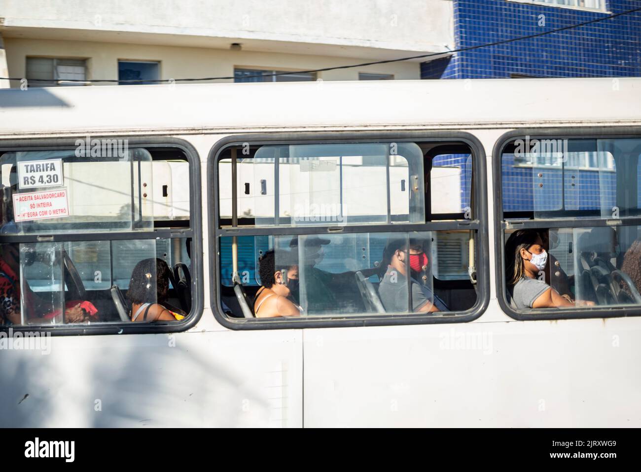 A view of passengers wearing a protective mask against covid-19 inside ...