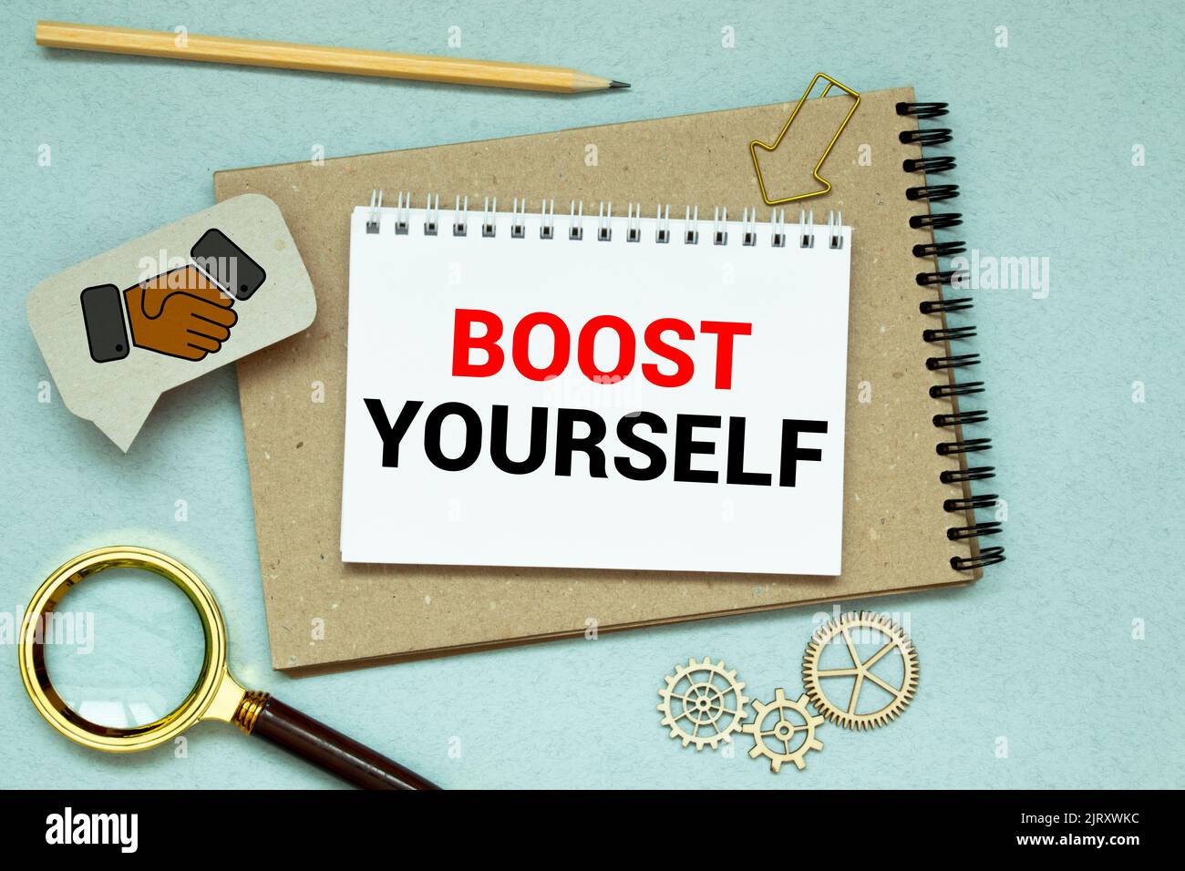 Boost yourself. The inscription in the business planning folder, on the ...