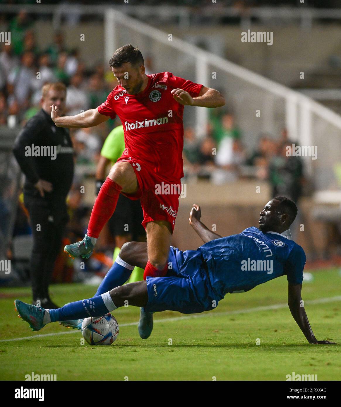 Omonia's Adam Matthews and Gent's Sulayman Marreh fight for the ball ...