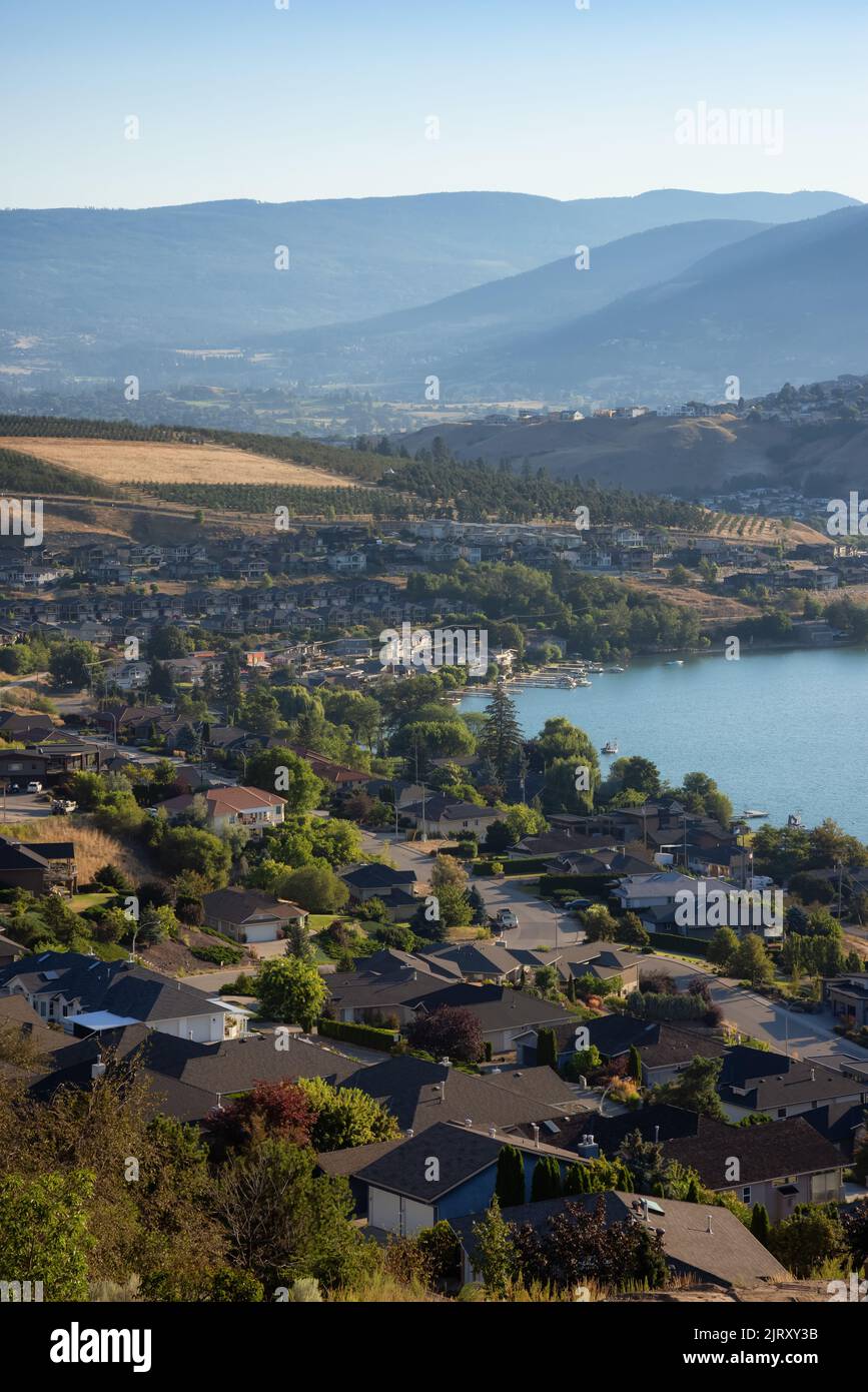 Scenic View of Kalamalka Lake and a small City during sunny summer ...