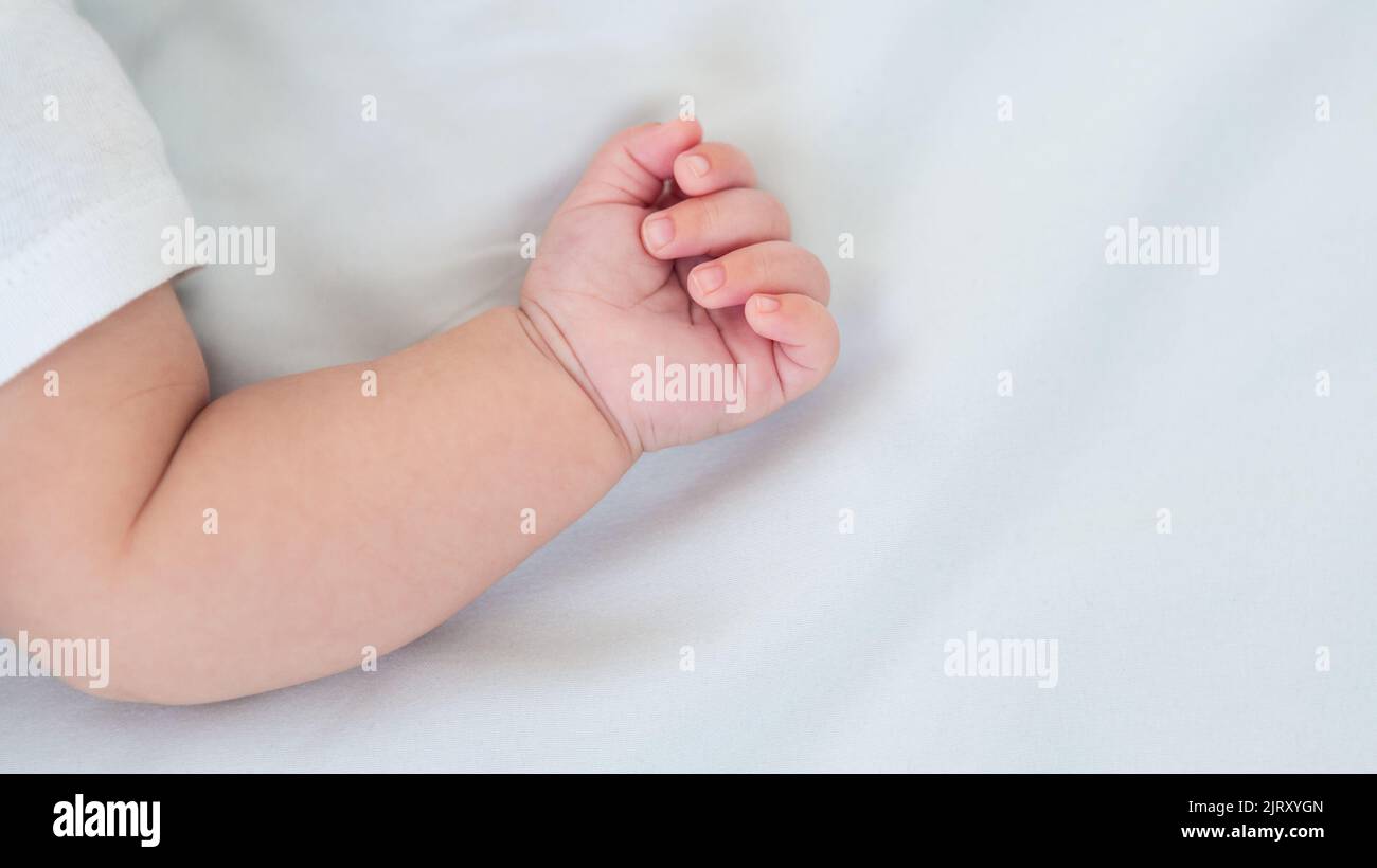Chubby baby arm hi-res stock photography and images - Alamy