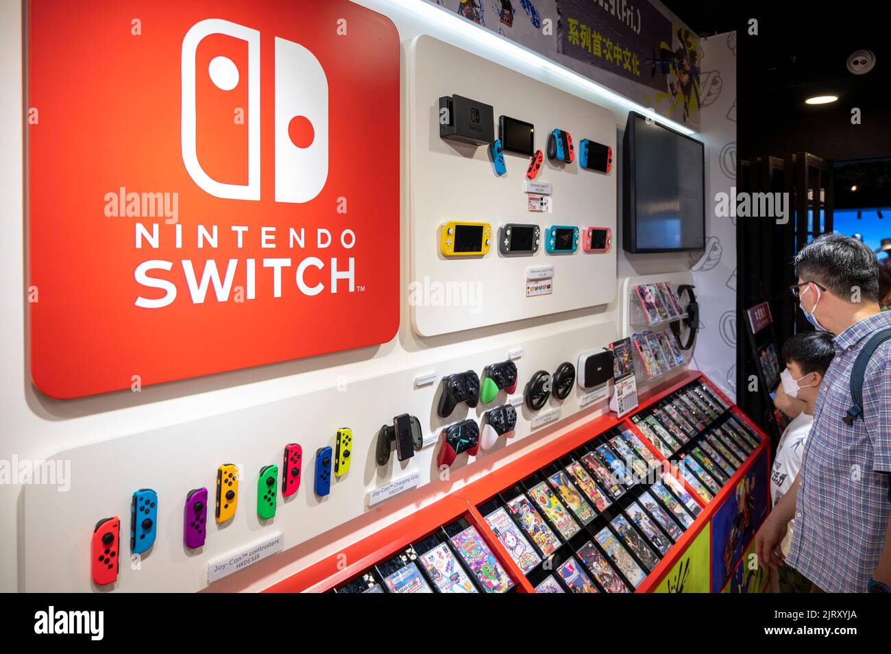 Shoppers browse Japanese multinational video gaming brand Nintendo Switch console products at a store in Hong Kong. Photo by Budrul Chukrut SOPA Images Sipa USA Stock Photo Alamy