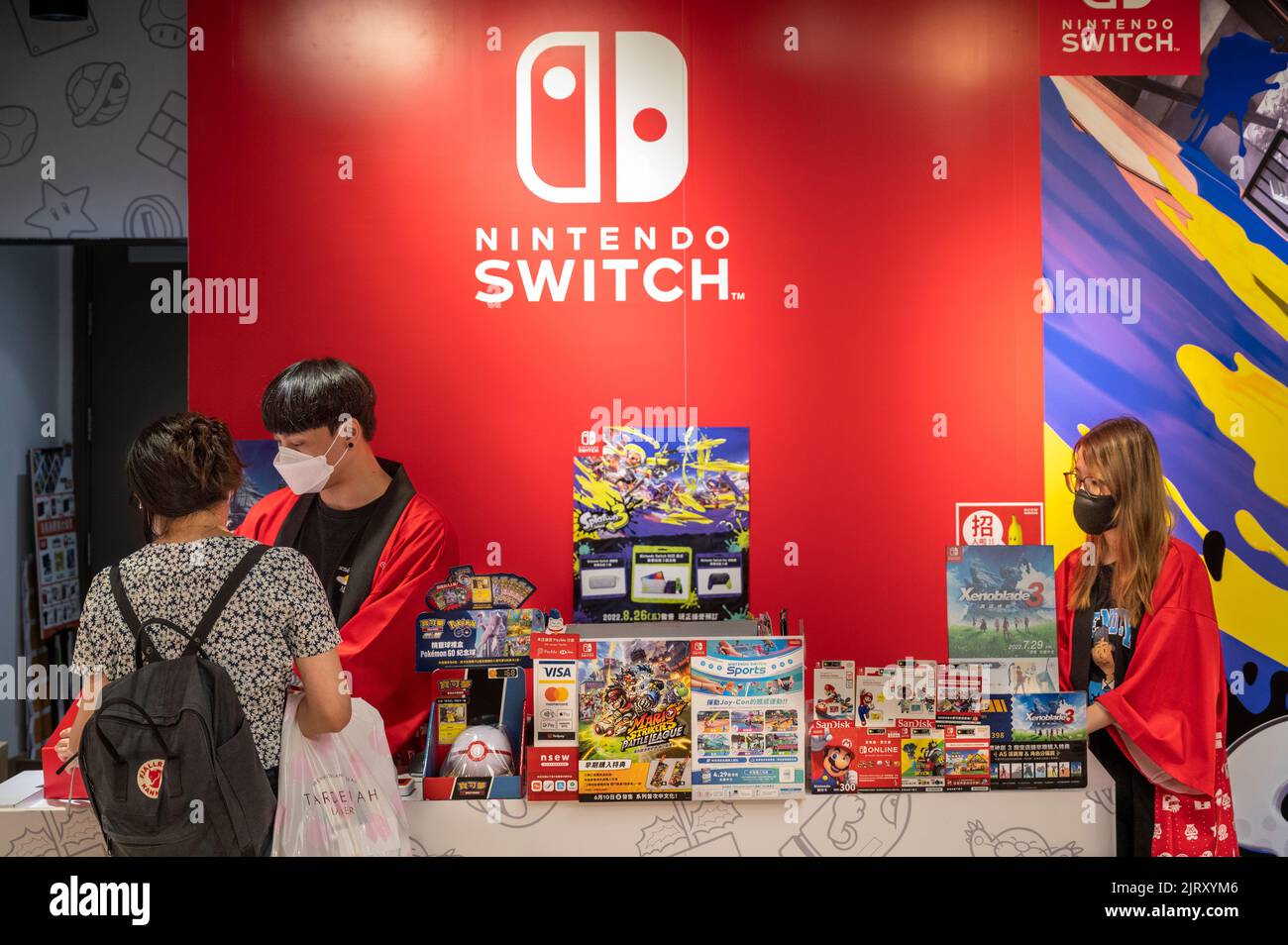 A client is seen at a store selling Japanese multinational video gaming ...