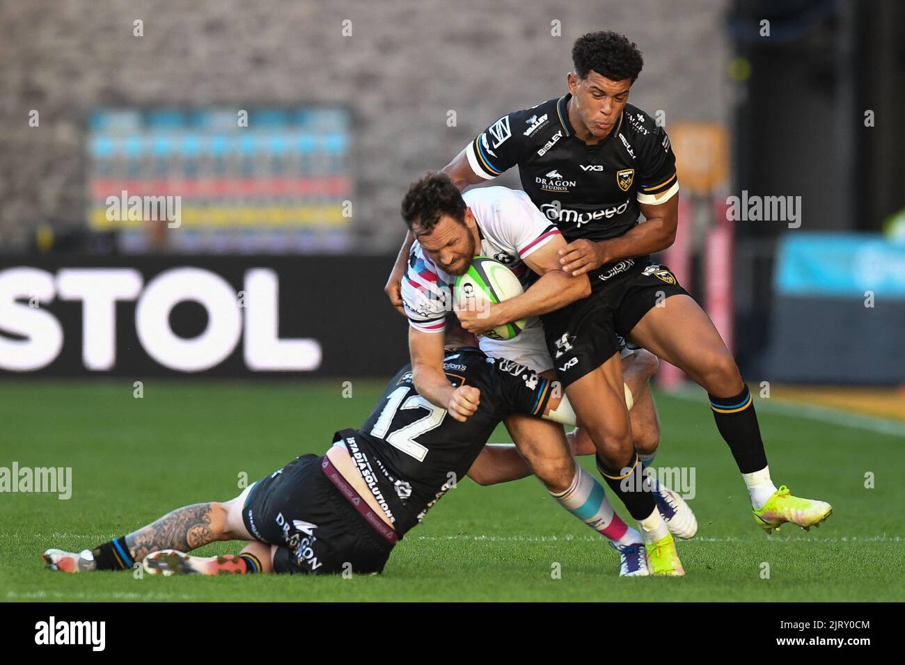 Luke Morahan of Bristol Bears tackled by Rio Dyer of Dragons Rugby, and ...