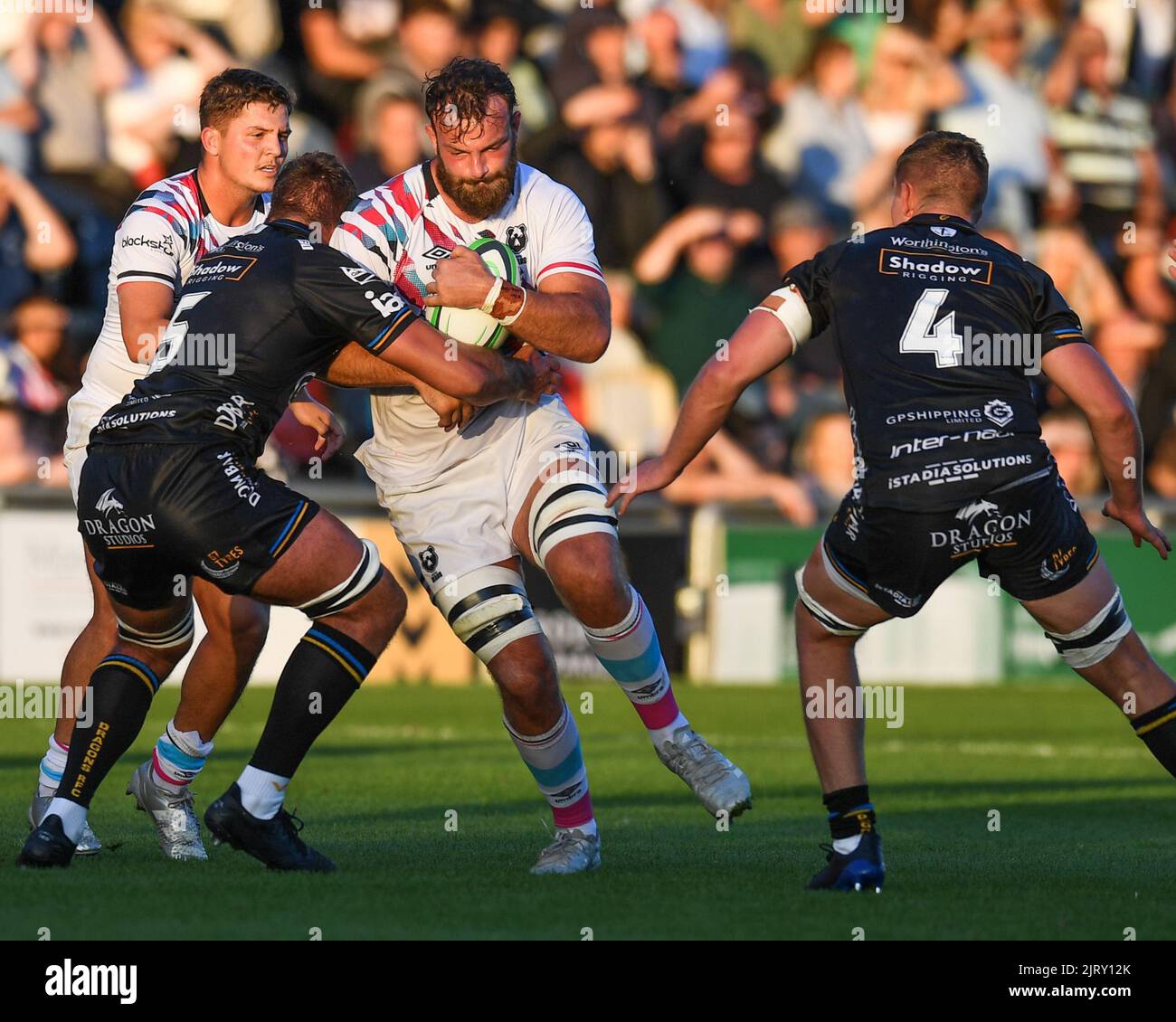 Morgan Eames of Bristol Bears takes on Sean Lonsdale of Dragons Rugby ...