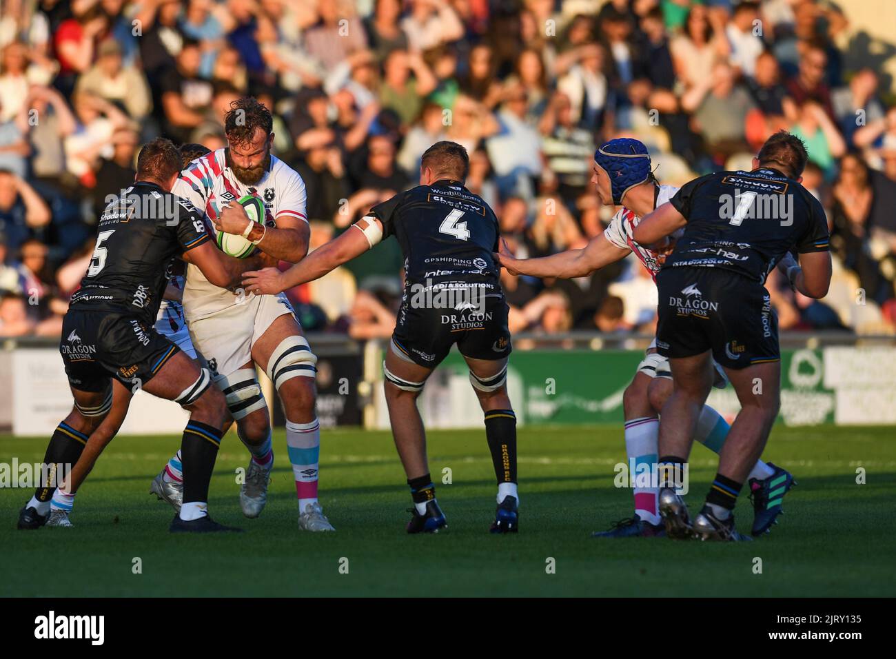 Morgan Eames of Bristol Bears takes on Sean Lonsdale of Dragons Rugby ...