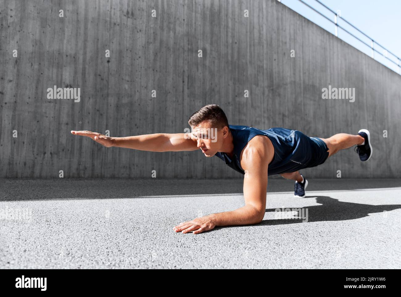 Athletic sportsman doing plank hi-res stock photography and images - Alamy