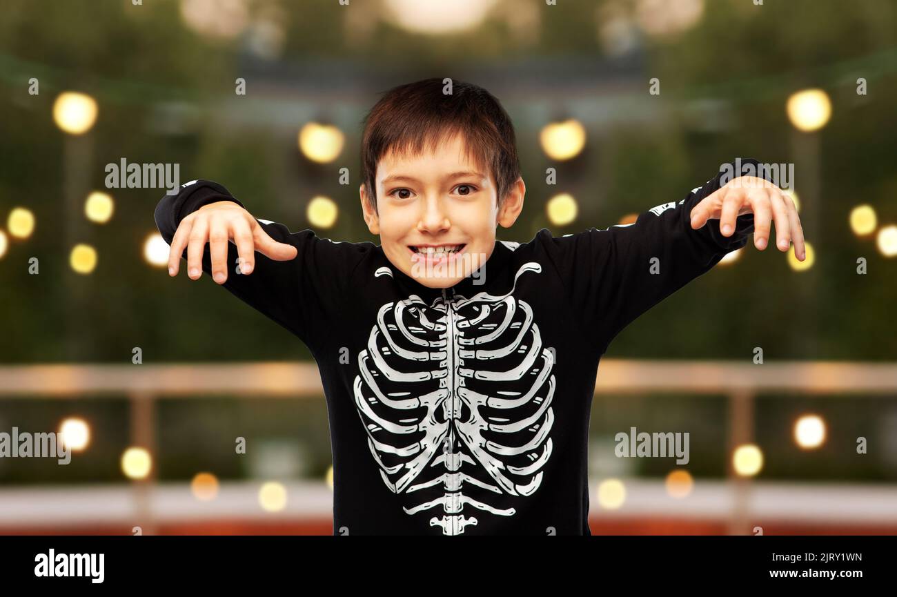 boy in halloween costume of skeleton frightening Stock Photo - Alamy