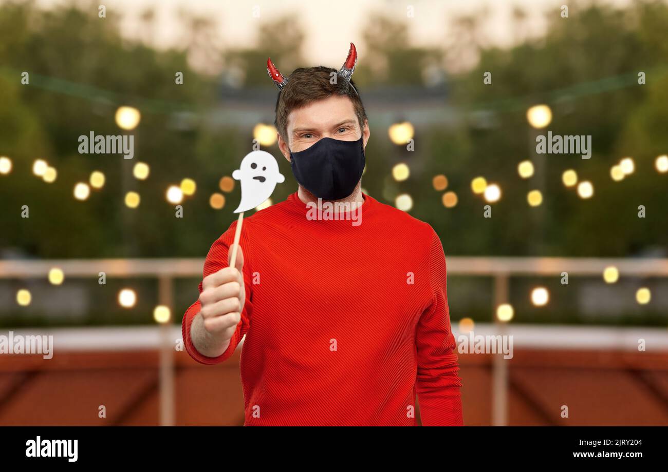 man in halloween costume of devil and mask Stock Photo - Alamy