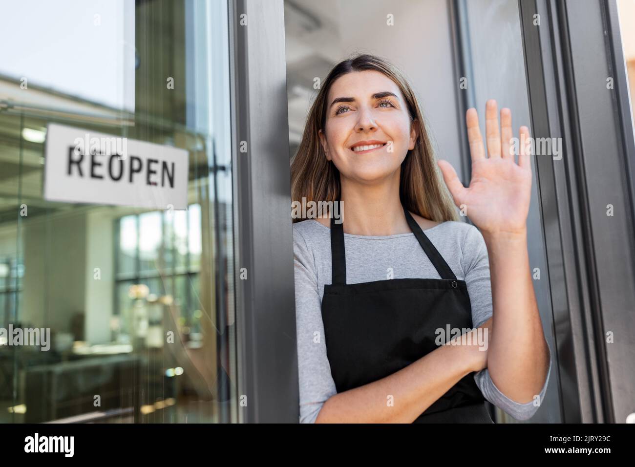 Door woman hi hi-res stock photography and images - Alamy