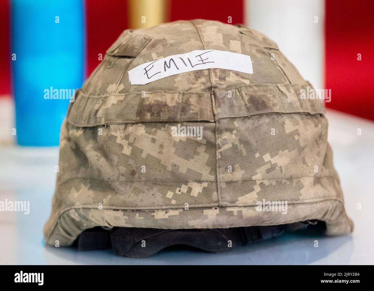 An army helmet with the name Emile is shown during a service organized ...