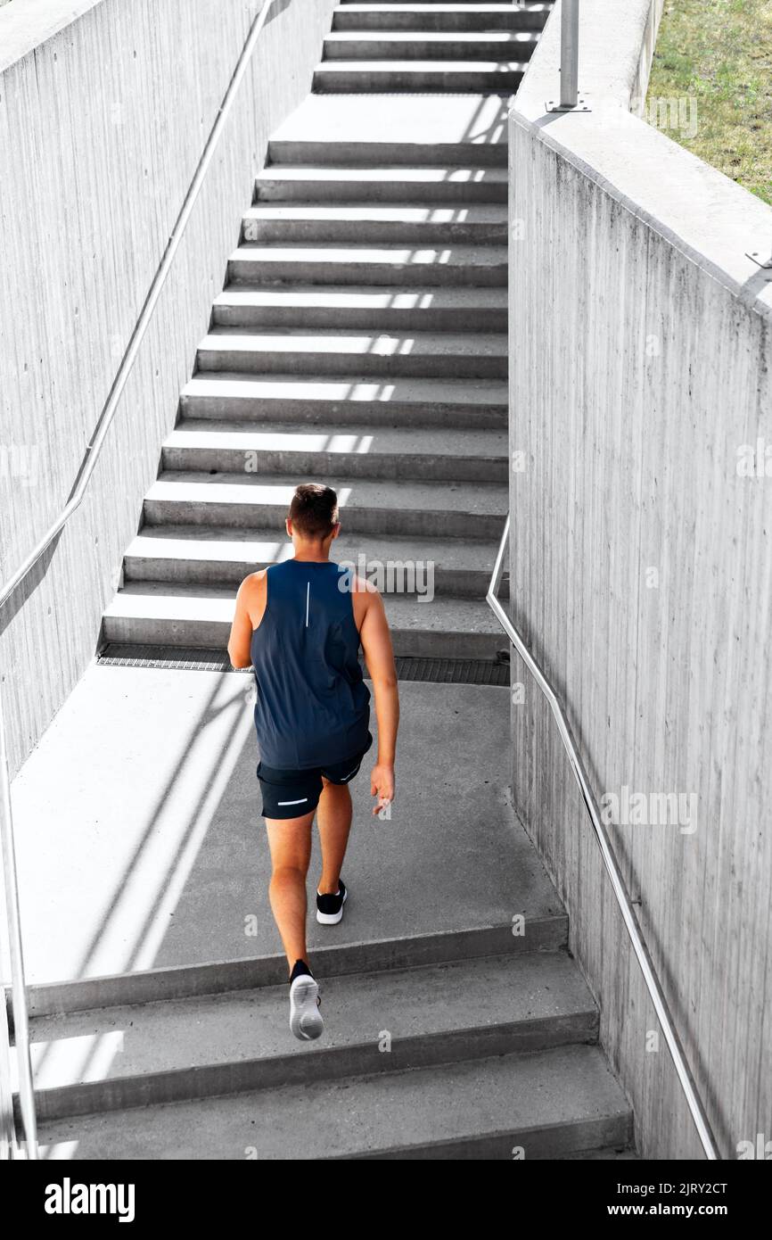 Man running rear view urban hi-res stock photography and images - Alamy