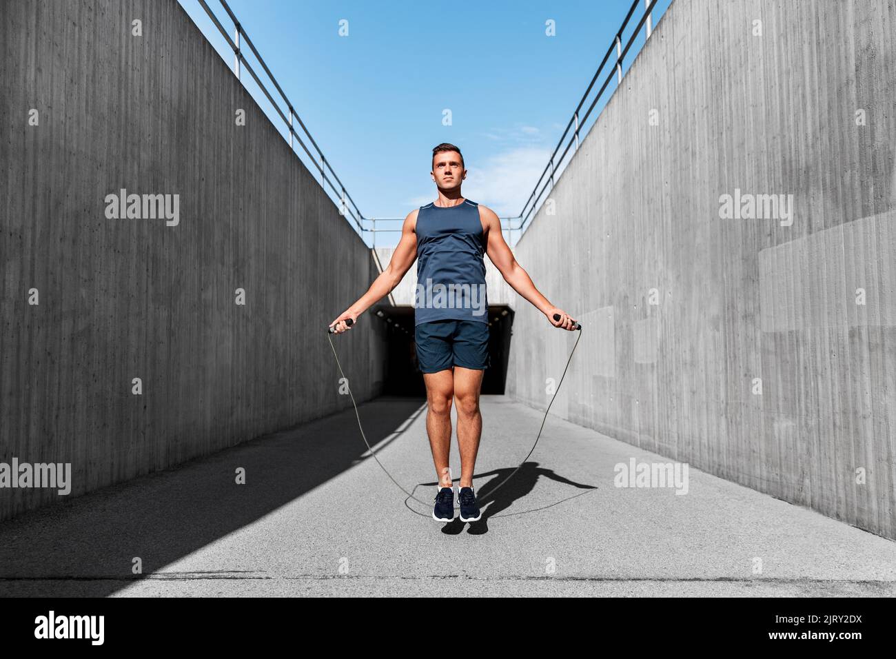 Serious sportsman jumping rope hi-res stock photography and images - Alamy