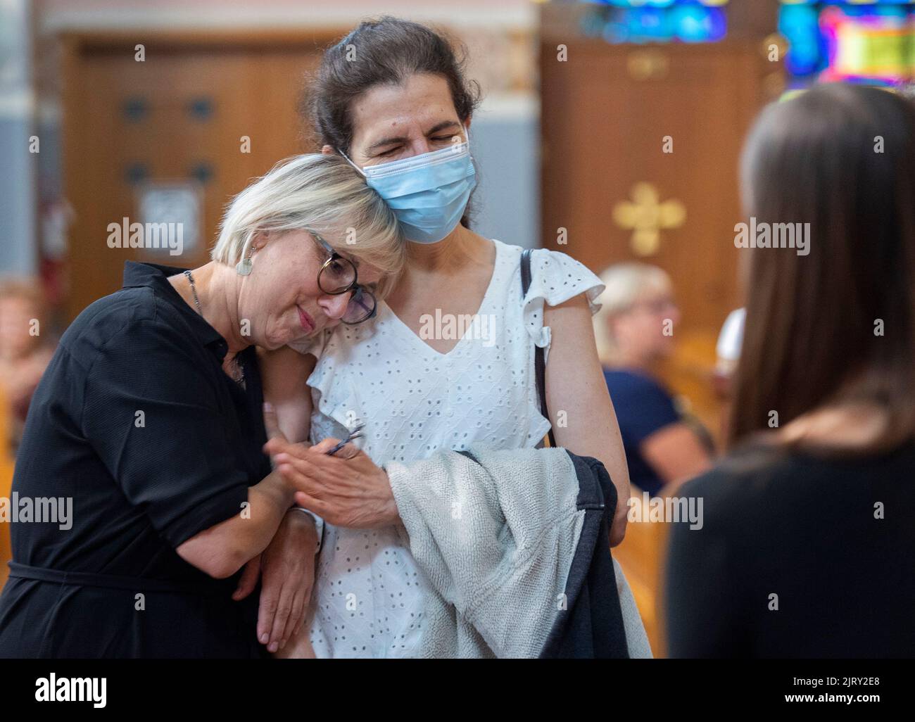 Marie-France Sirois, left, attends a service organized by the Ukrainian ...