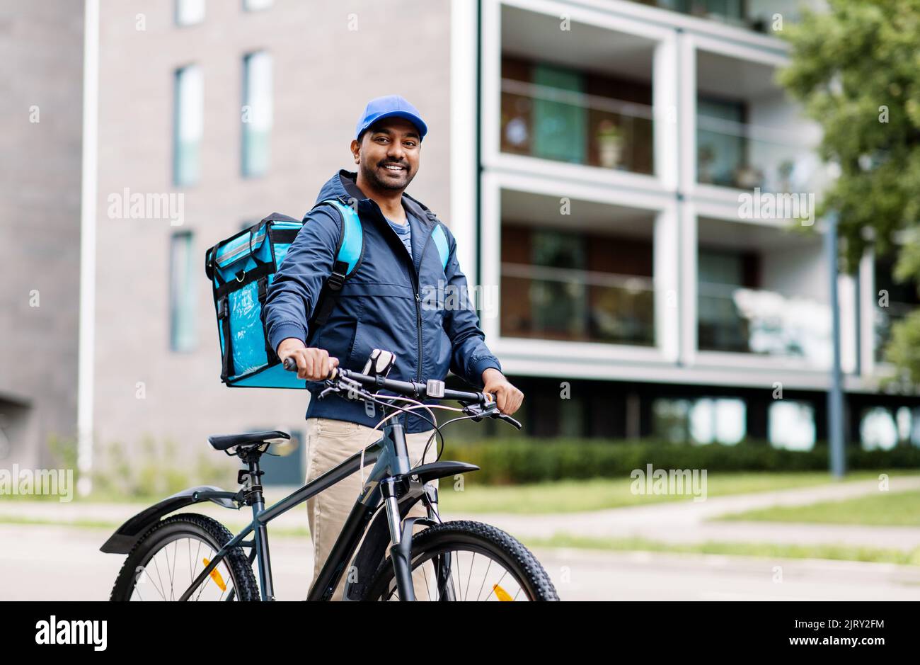 Indian bike delivery boy hi-res stock photography and images - Alamy