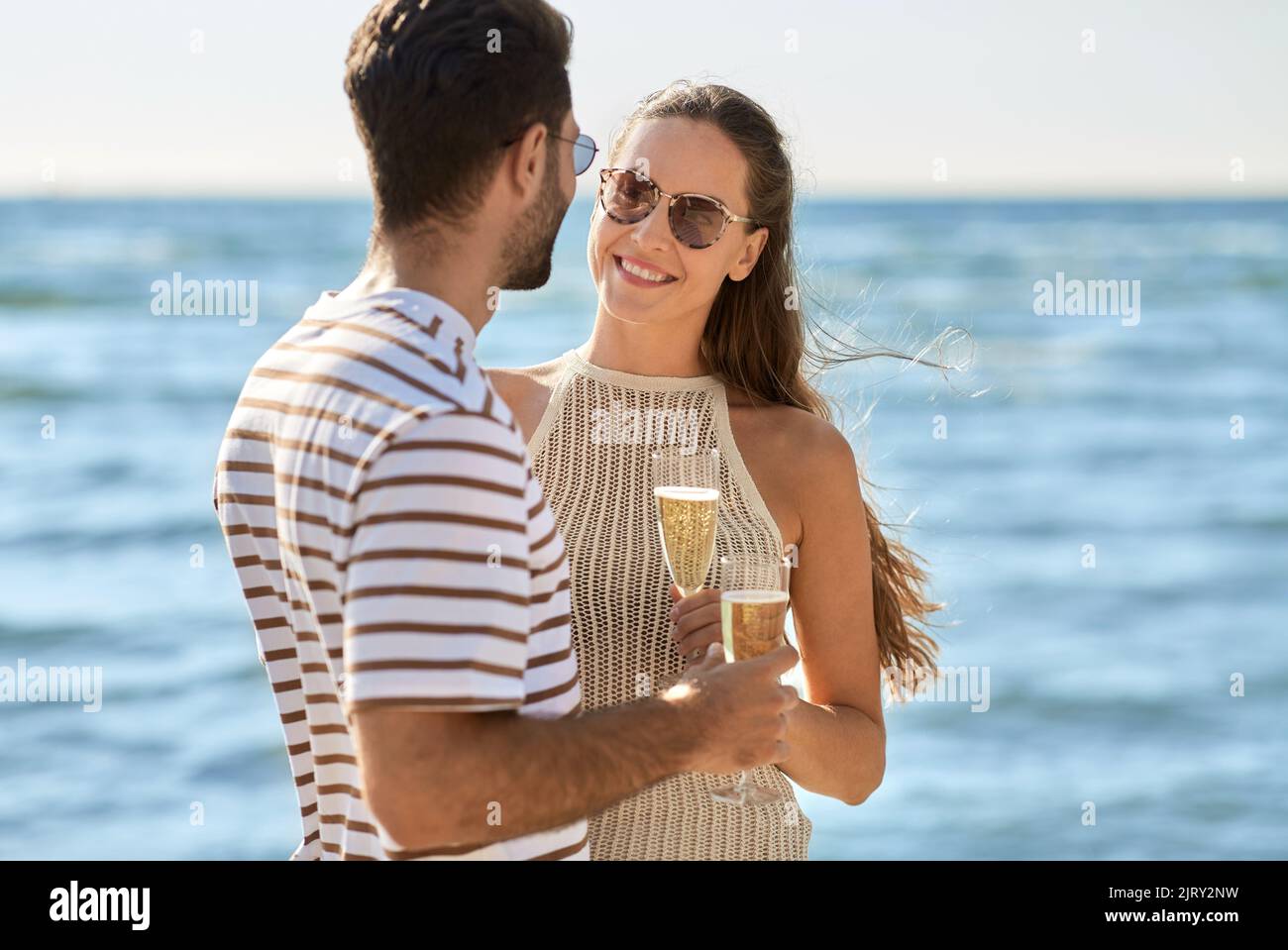 Champagne woman drinking beach hi-res stock photography and images - Alamy