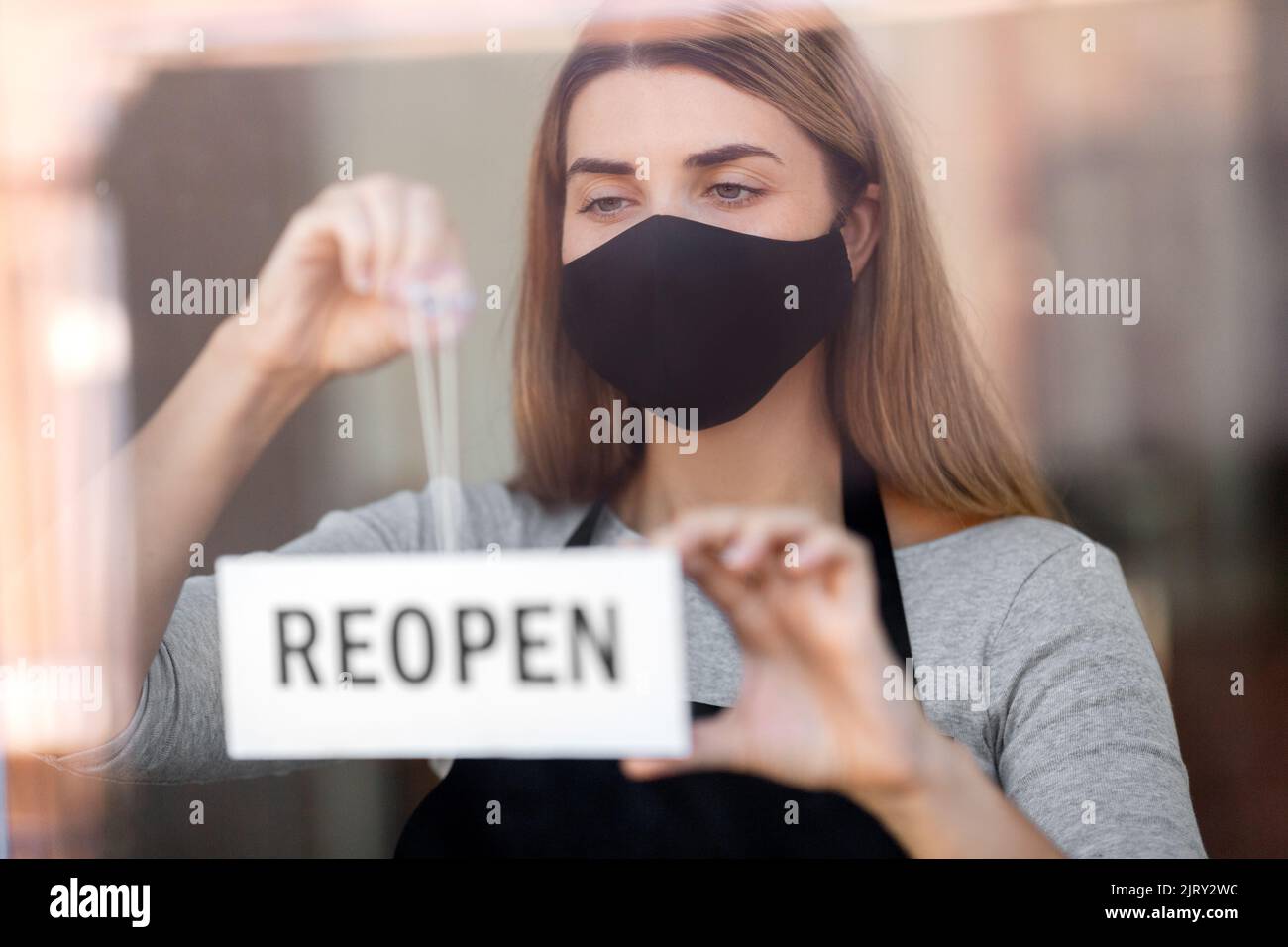 Reopen banner on door hi-res stock photography and images - Alamy
