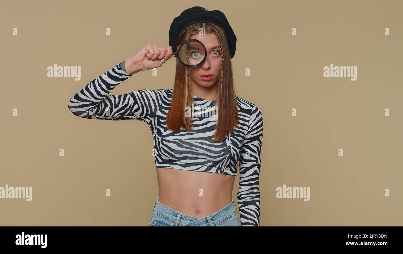 Investigator researcher scientist woman holding magnifying glass near ...