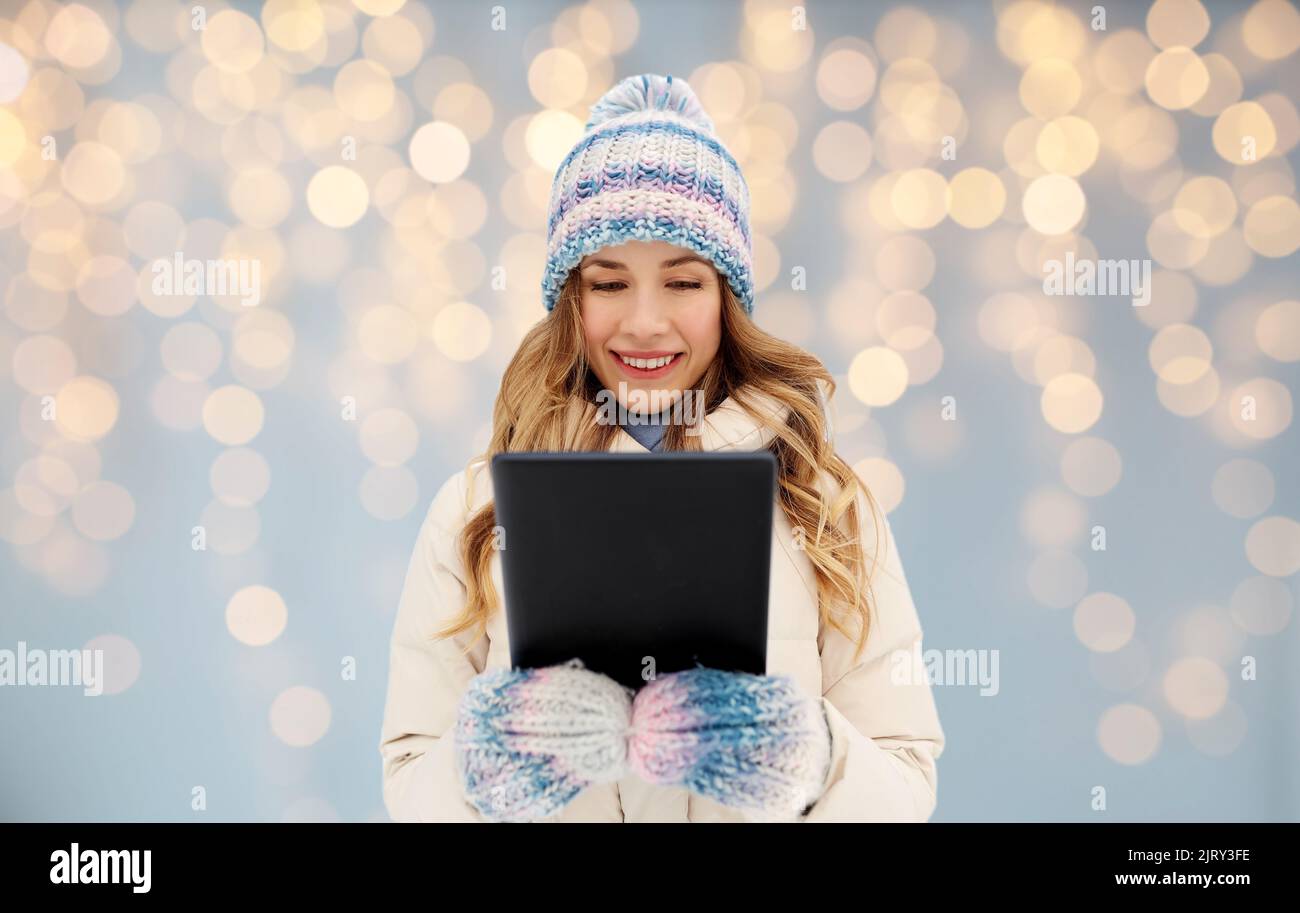 woman with tablet computer outdoors in winter Stock Photo - Alamy
