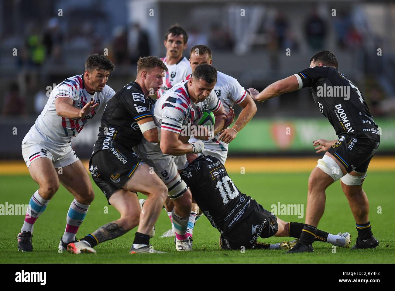 Magnus Bradbury of Bristol Bears tackled on JJ Hanrahan of Dragons ...