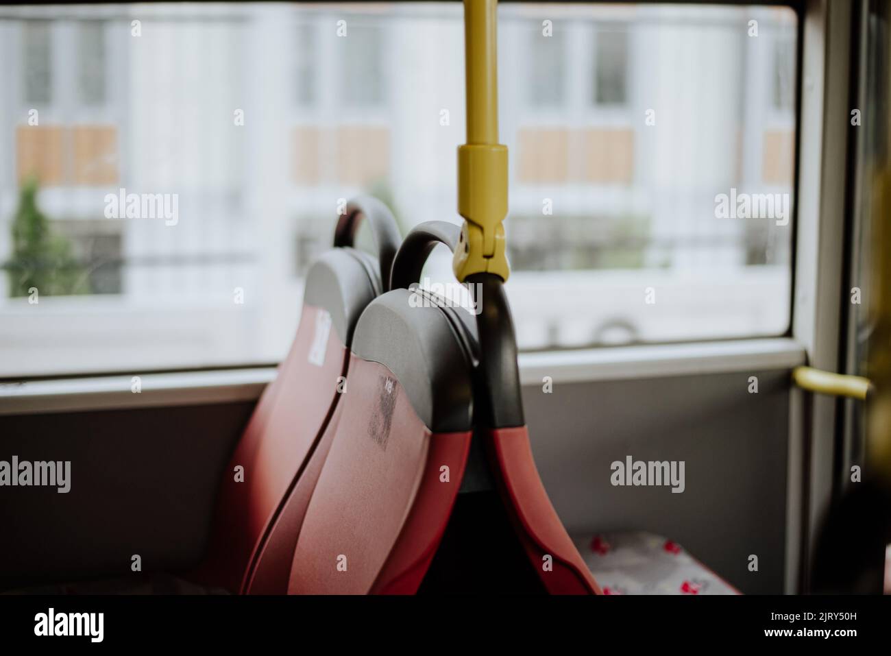 The chairs and windows inside a bus Stock Photo - Alamy