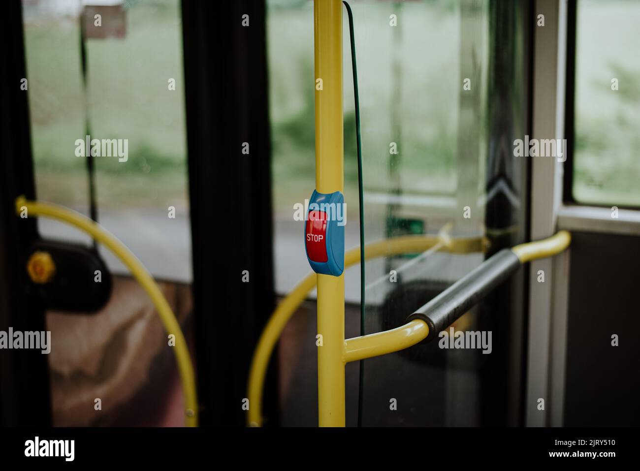 A red stop button in the bus Stock Photo - Alamy