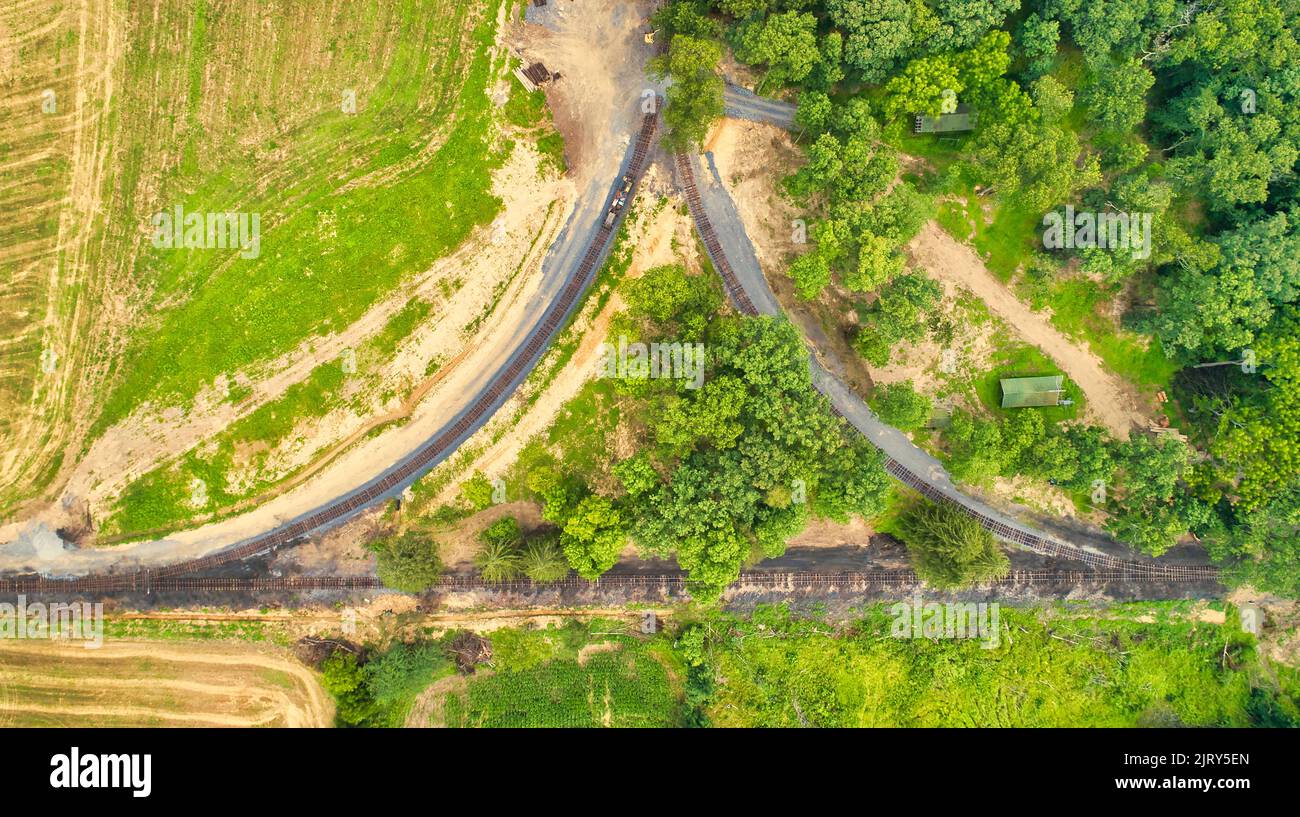 A Drone Downward View of a Train Track Wye, Turn Around, Under ...