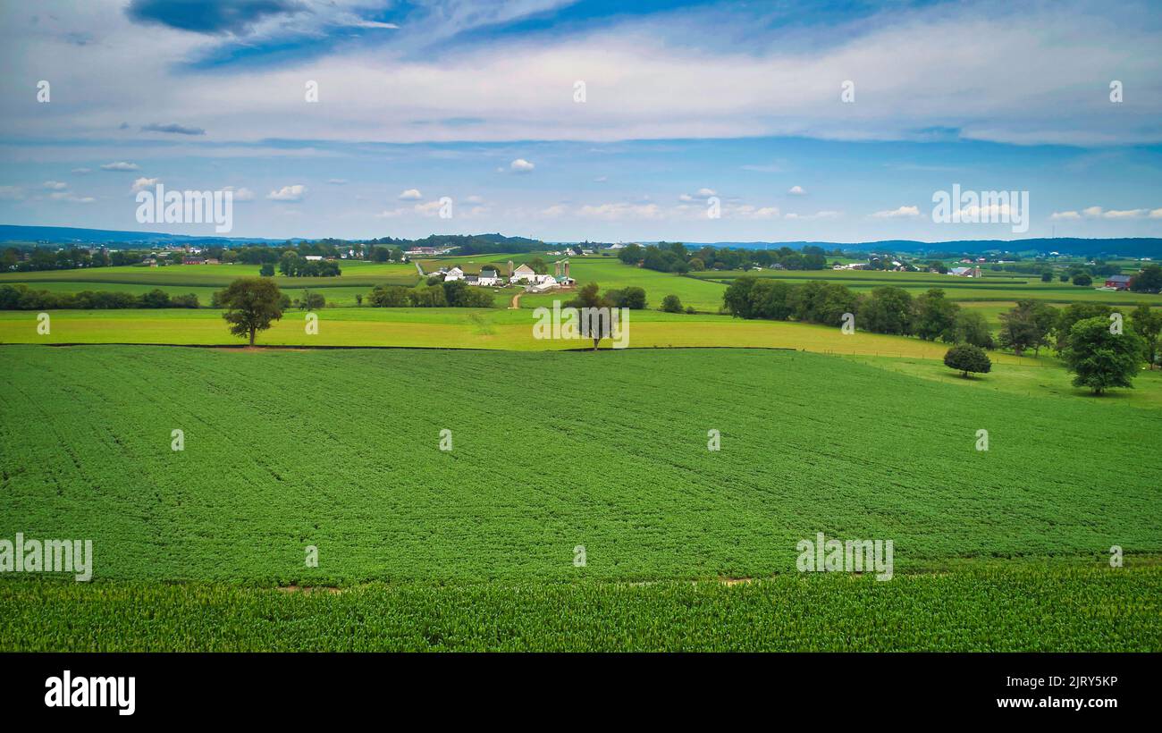 Drone View of Amish Countryside With Barns and Silos, a Patch Work of ...