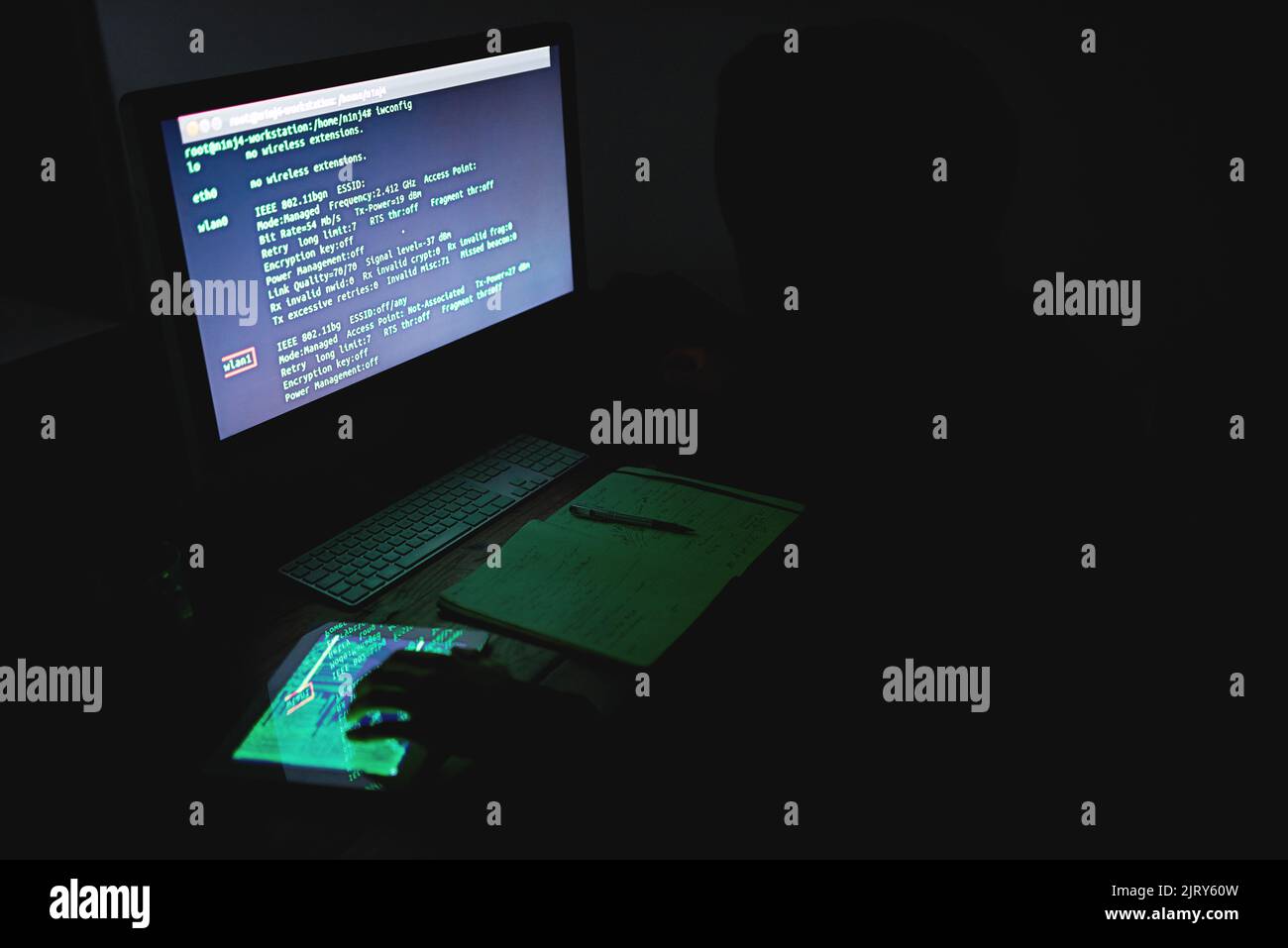 Do Your Best To Protect Your Data An Unidentifiable Hacker Using A Computer Late At Night Stock