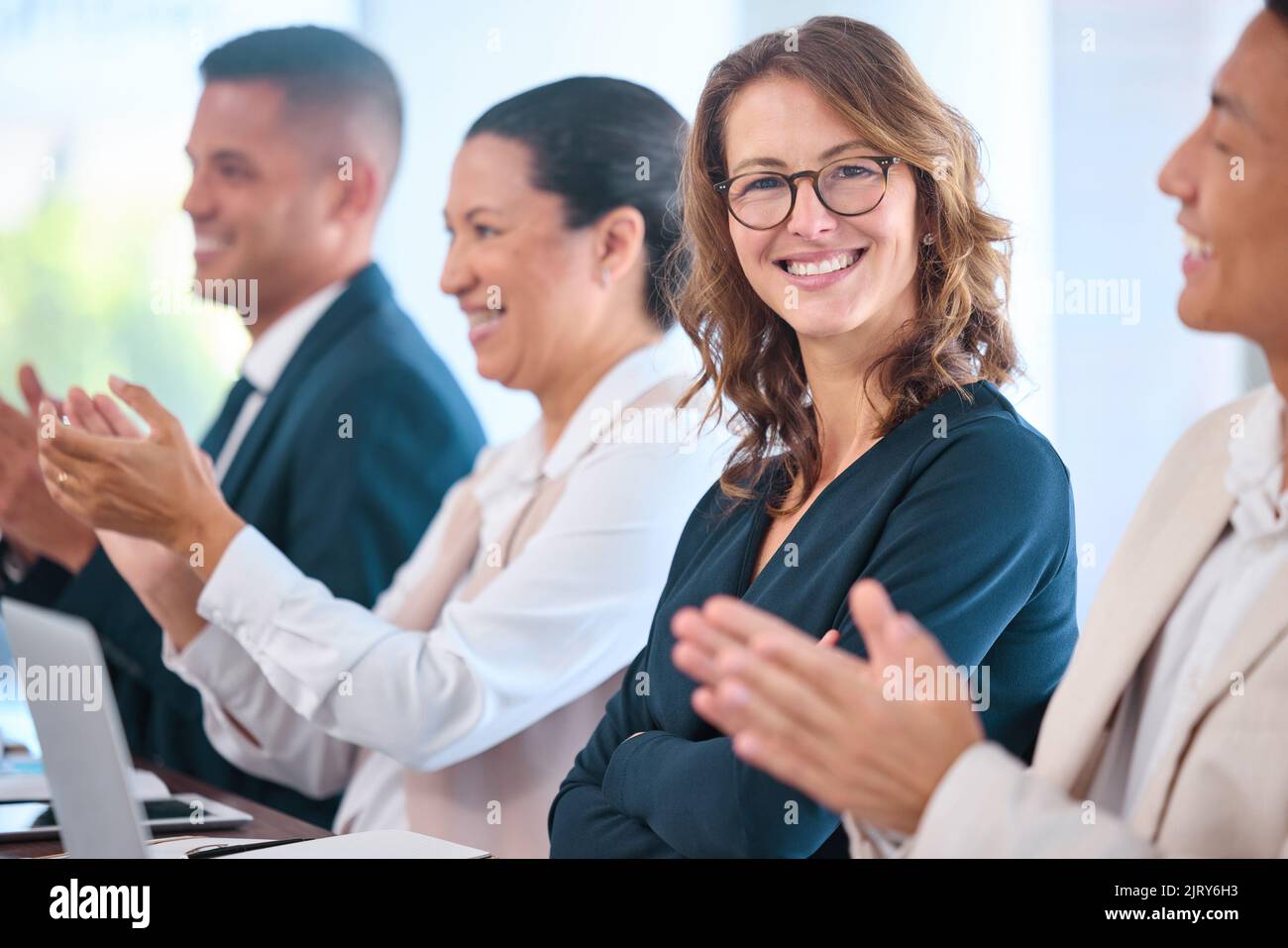 Motivation, vision and collaboration by clapping business people ...