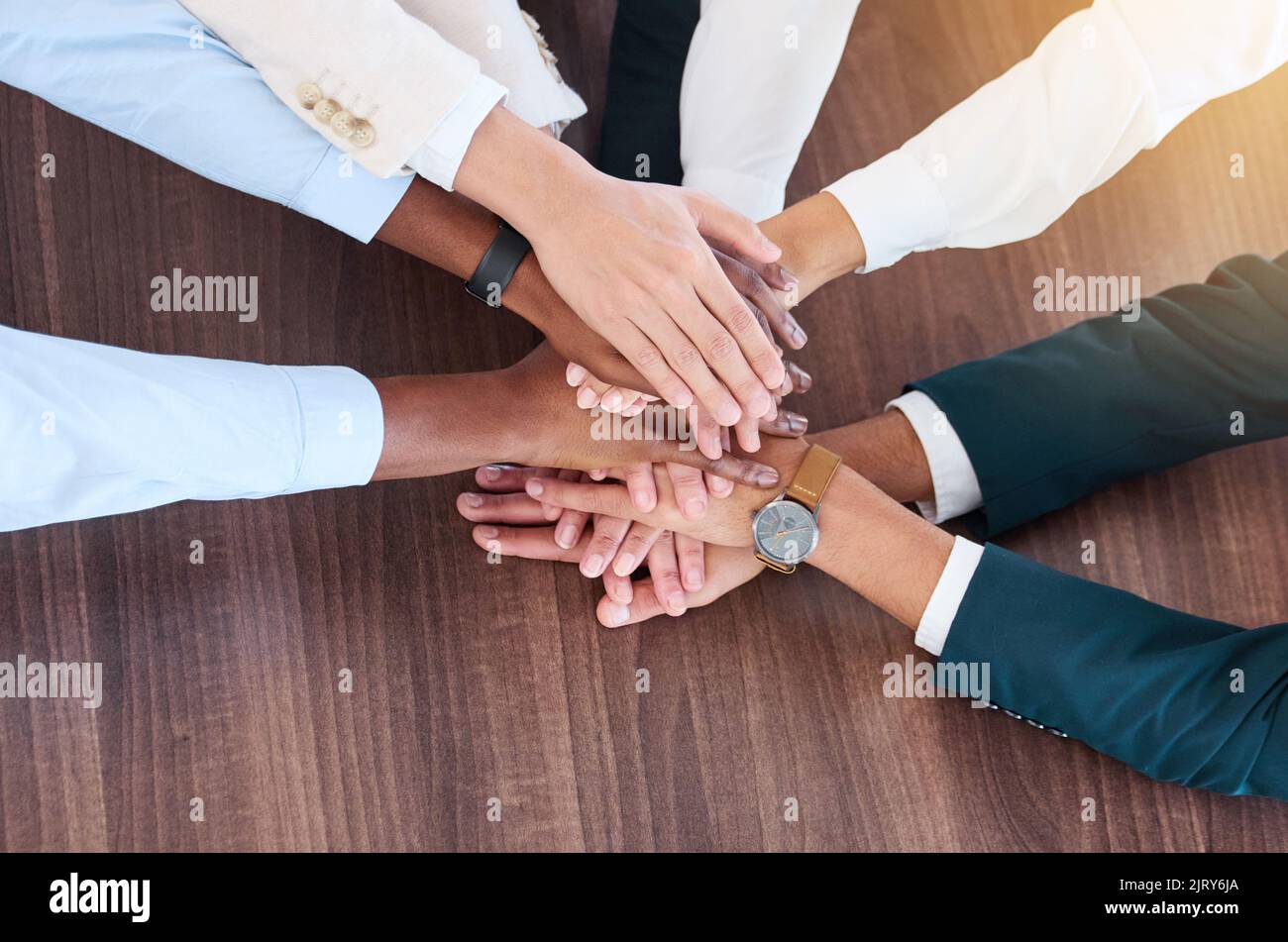 Community, teamwork and support by hands united in support of global ...