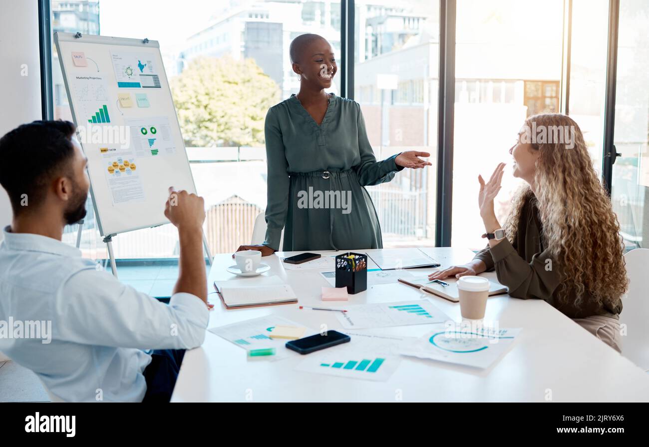 Black business woman giving a presentation with data, charts and graphs ...