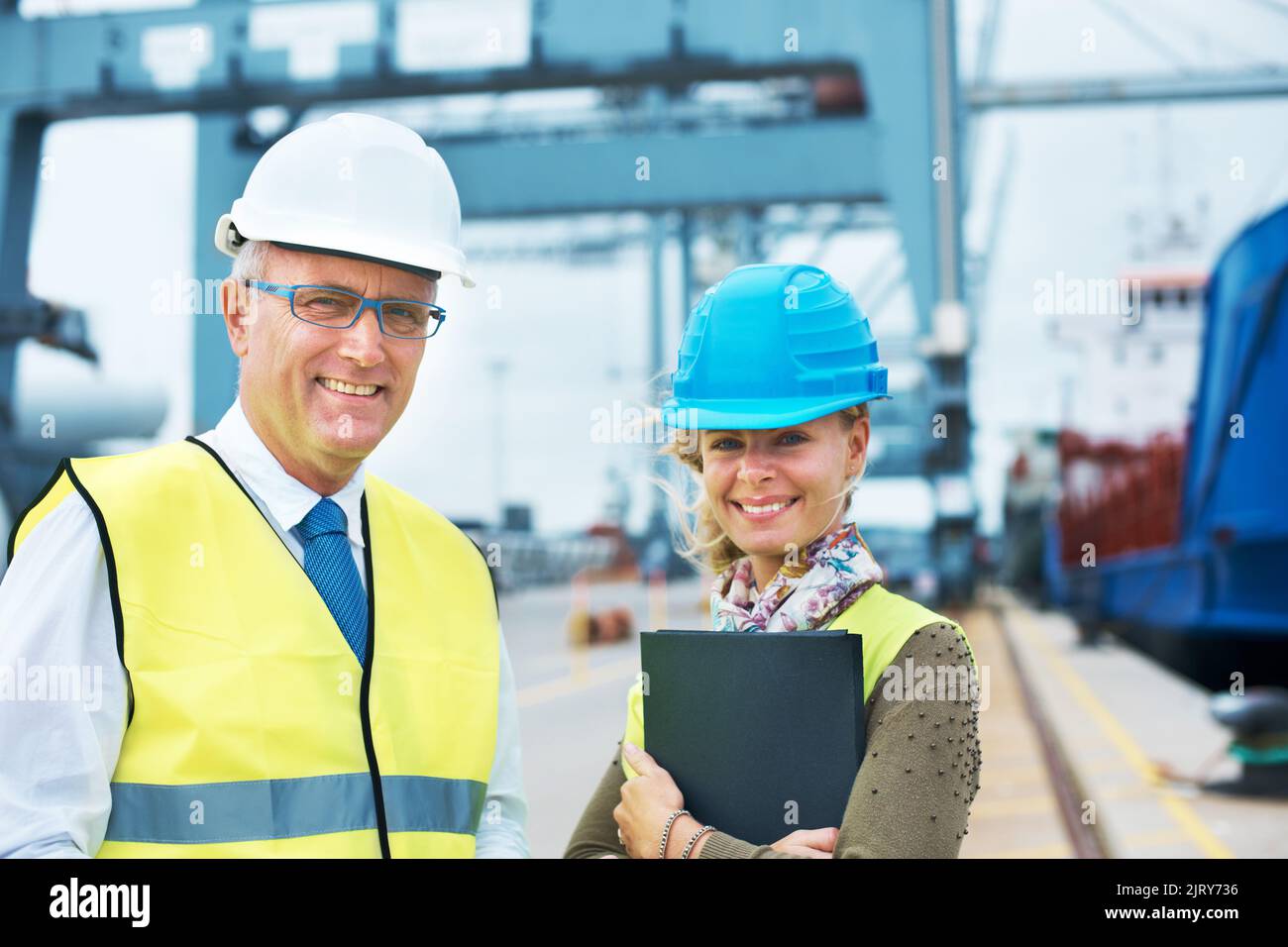 Portrait shipping, logistics and cargo delivery workers smile at a dock ...