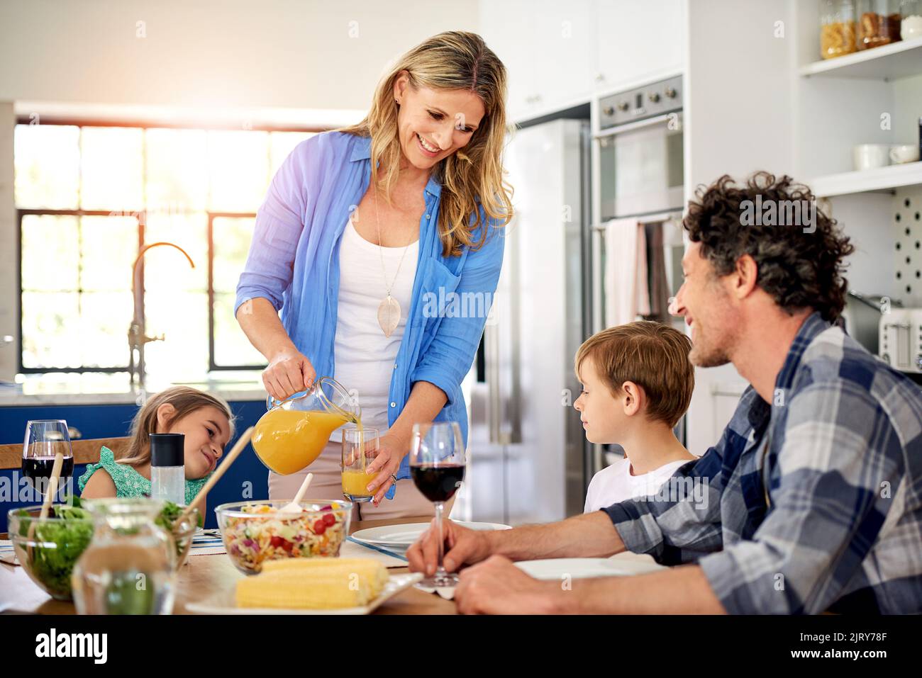 Food tastes better when you enjoy it with family. a happy family ...