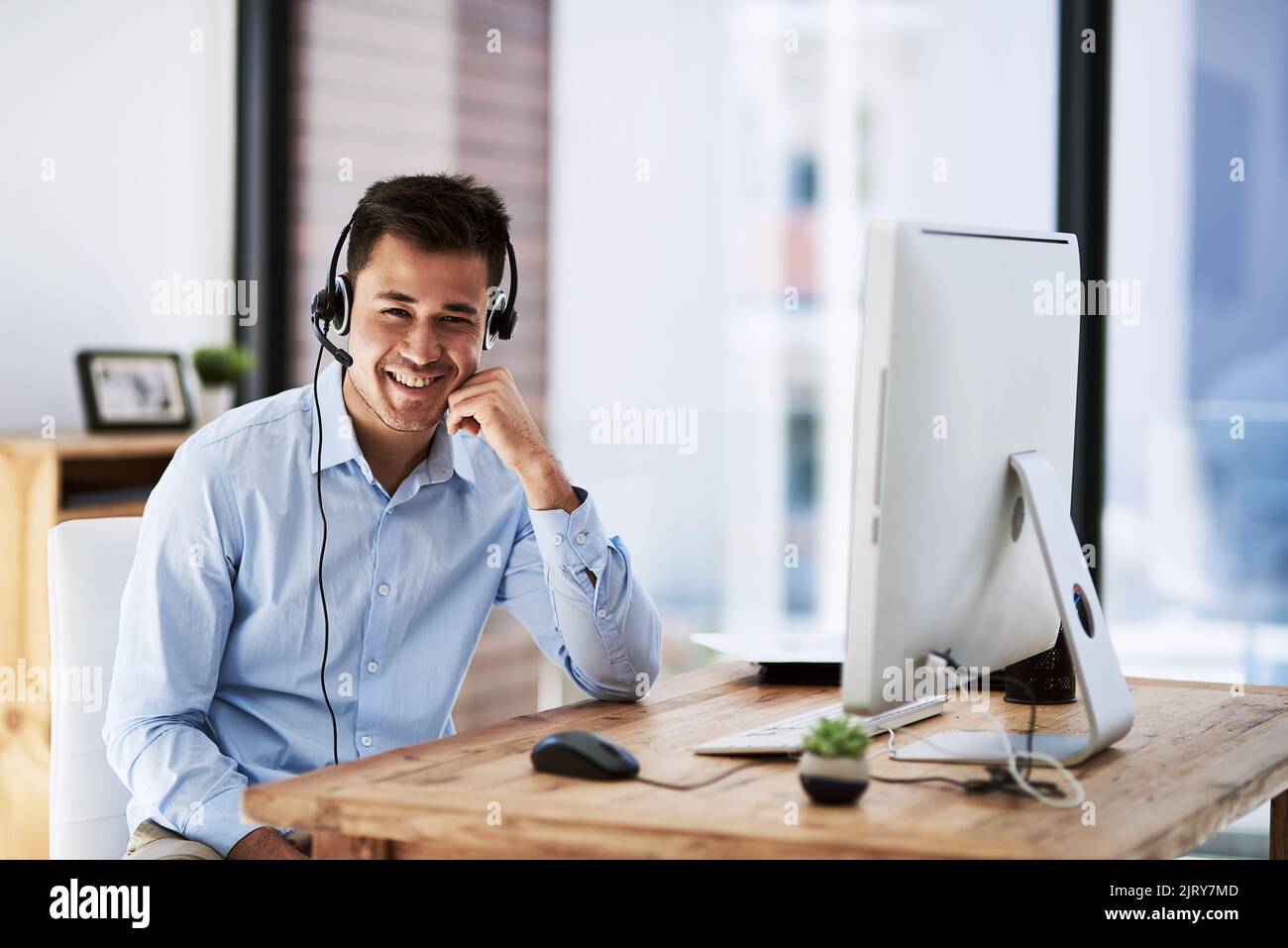 His professional support inspires customer satisfaction. Portrait of a ...