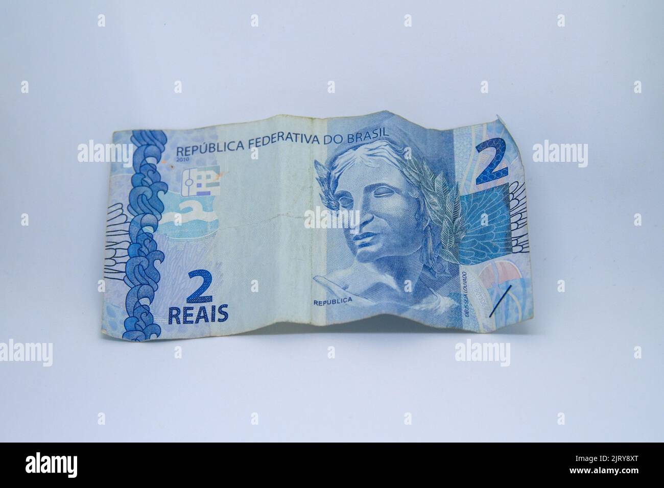 Two reais banknote (Brazilian currency) on a white background in Rio de ...