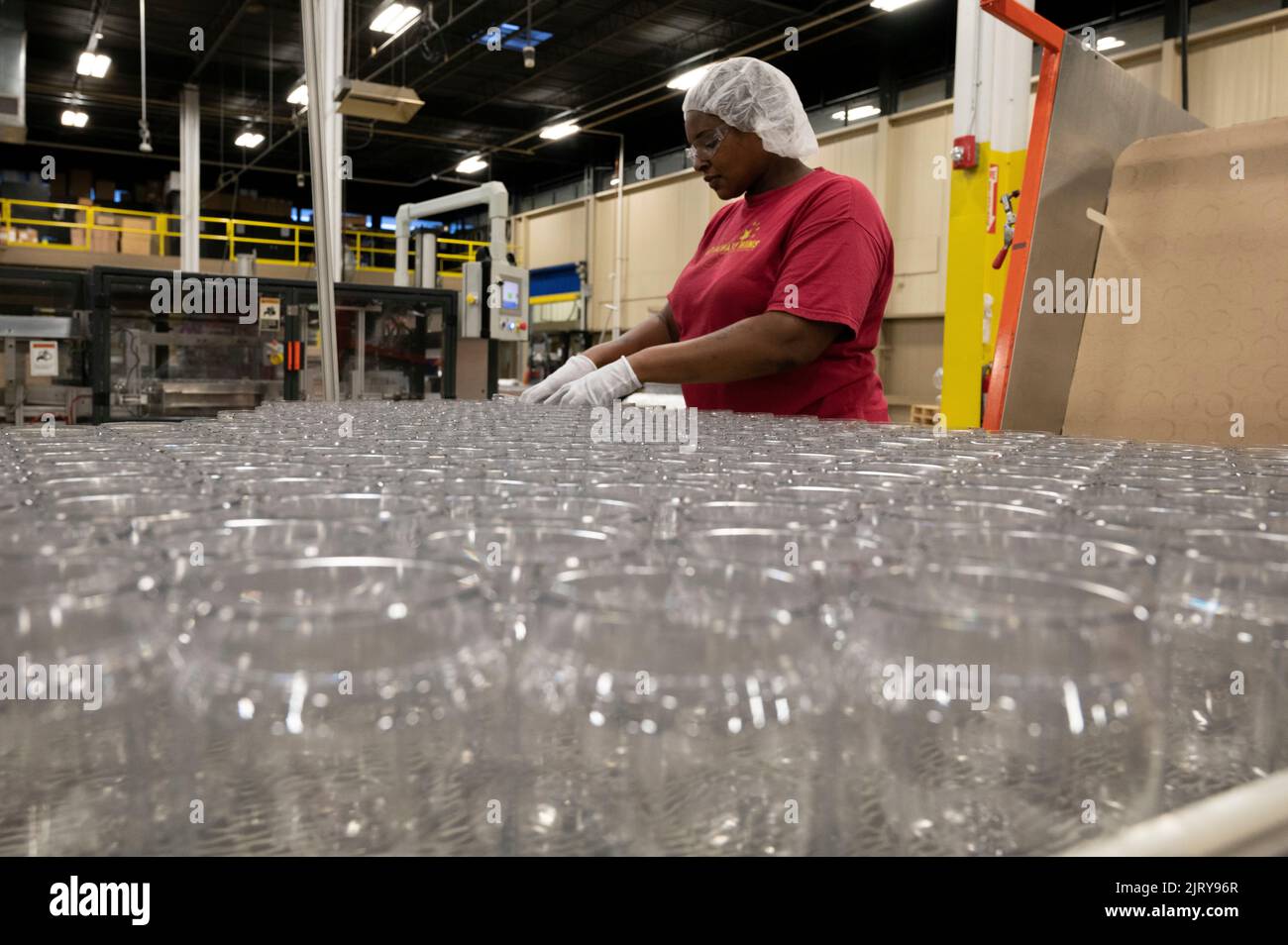 Atlanta, Georgia, USA. 3rd Aug, 2022. Worker packs just-finished wide ...