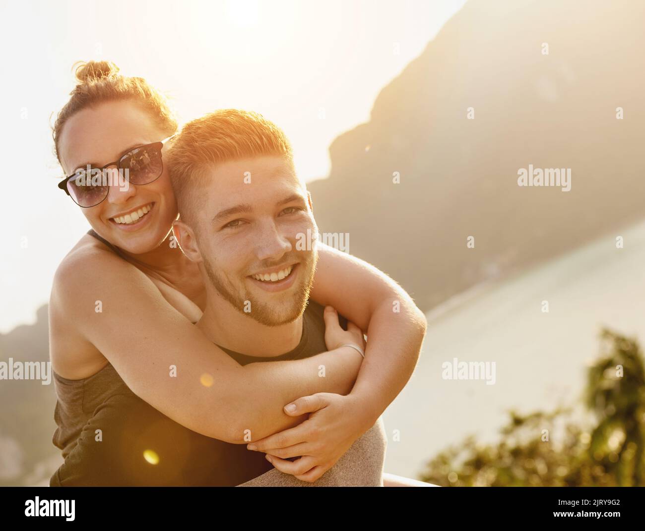 Nothing feels better than summer love. Portrait of a young man giving ...