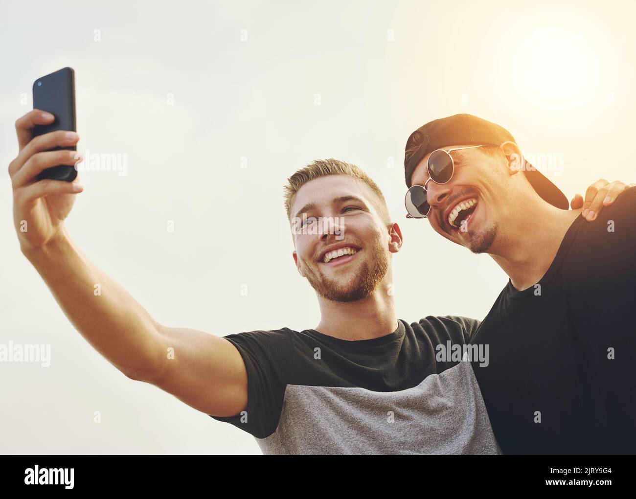 Two young men friends pose hi-res stock photography and images - Alamy