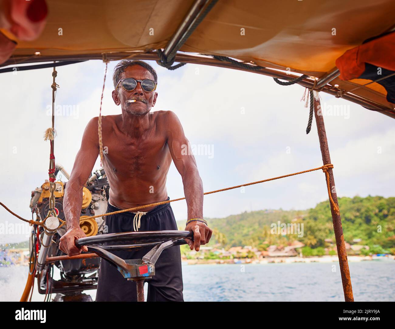 Operating a boat hi-res stock photography and images - Alamy