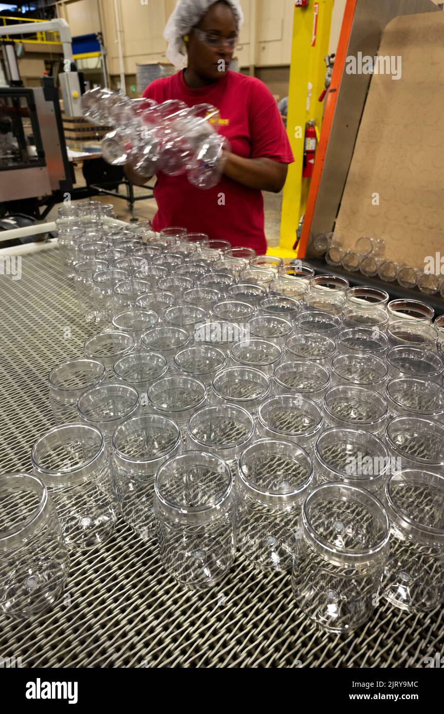 Atlanta, Georgia, USA. 3rd Aug, 2022. Worker packs just-finished wide ...