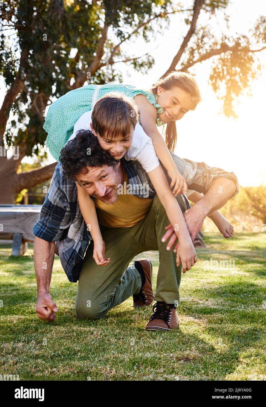 Never a dull moment when you have kids. Portrait of a happy father ...