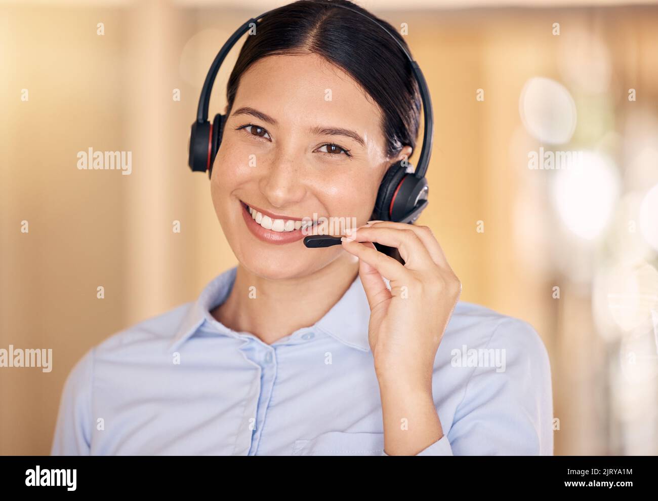 Call center agent, employee and worker with smile and headphone working ...