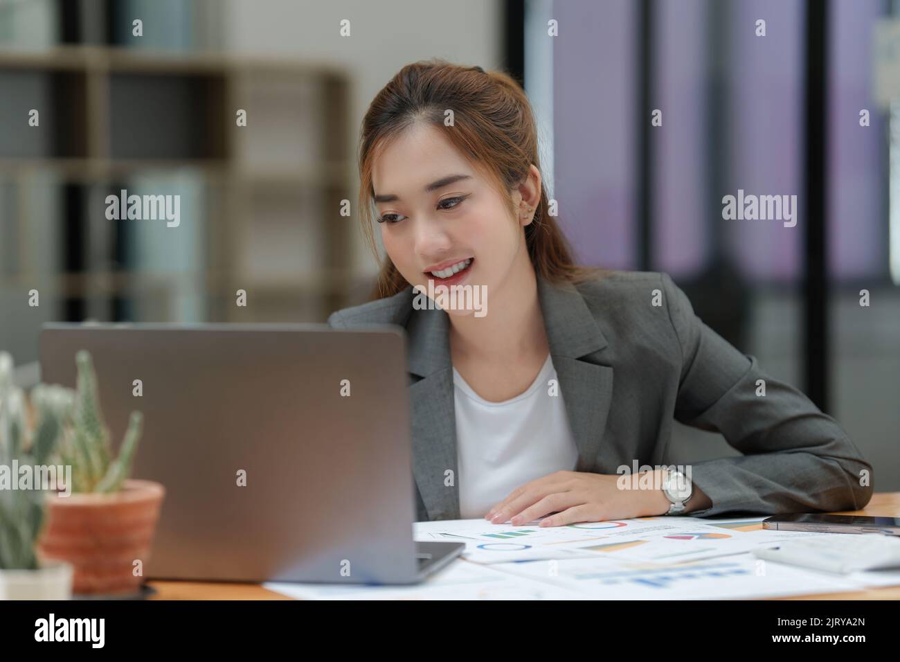 Modern business woman analysis financial paperwork document Stock Photo ...