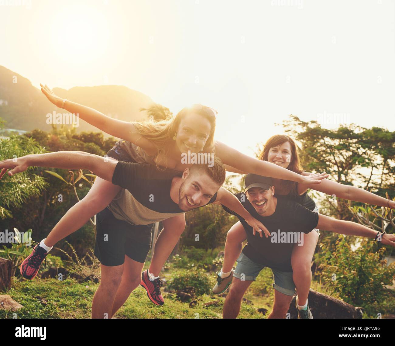 Embrace your playful side. a happy group of friends enjoying the day ...