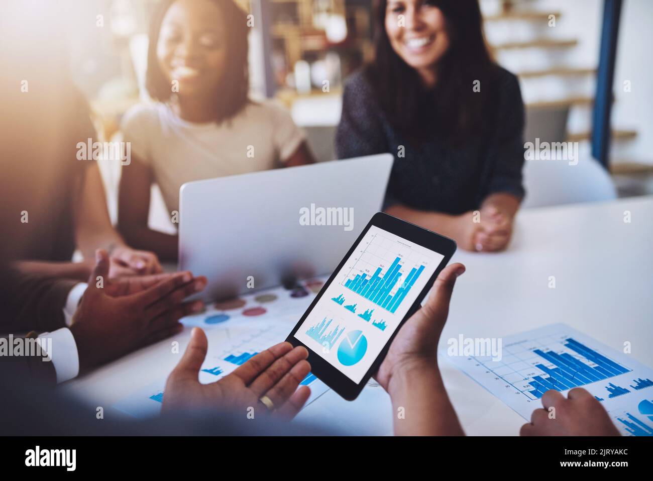 They never take their eyes off the stock markets. a group of young ...