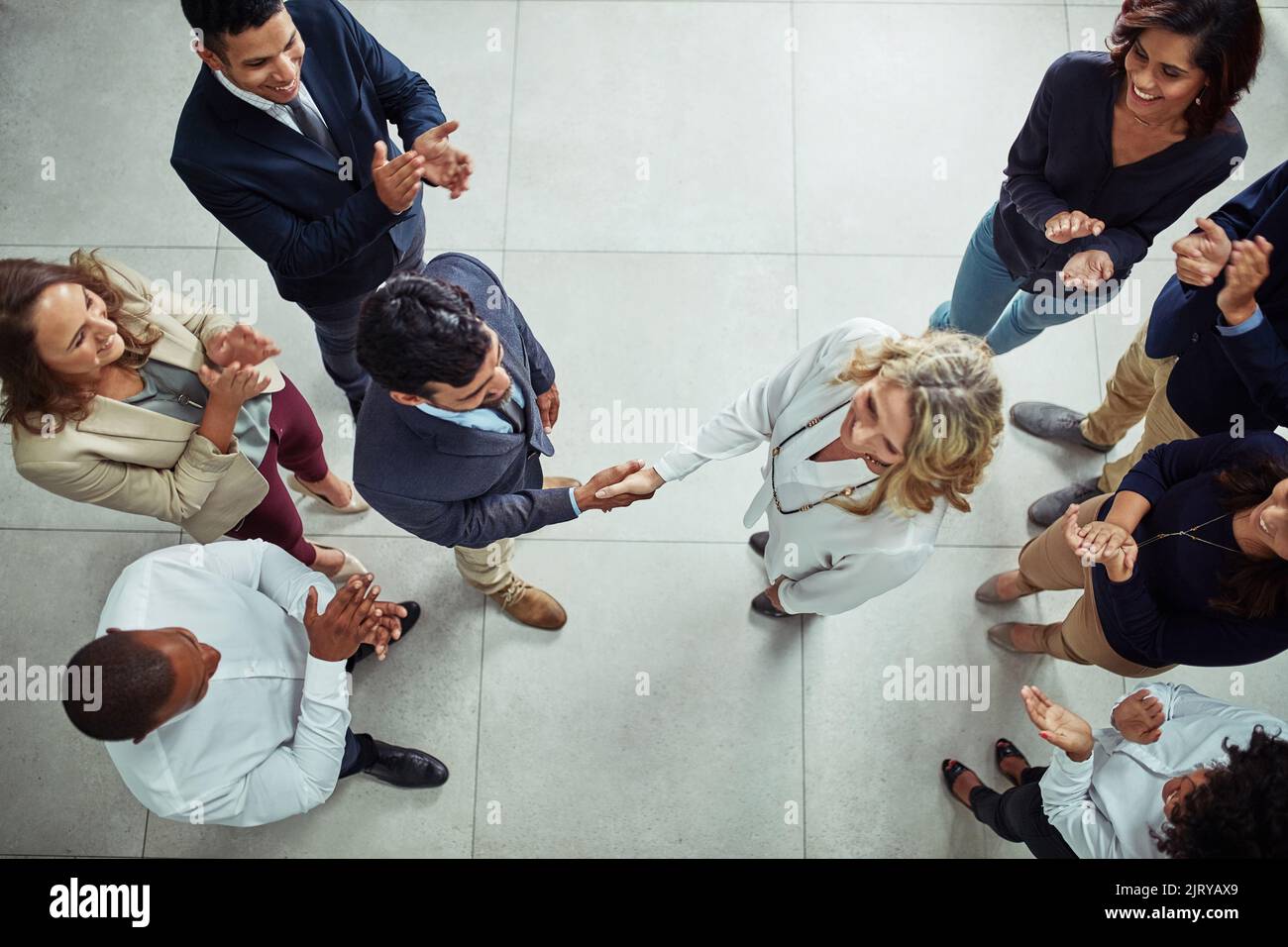 Its a new partnership worth celebrating. High angle shot of two ...