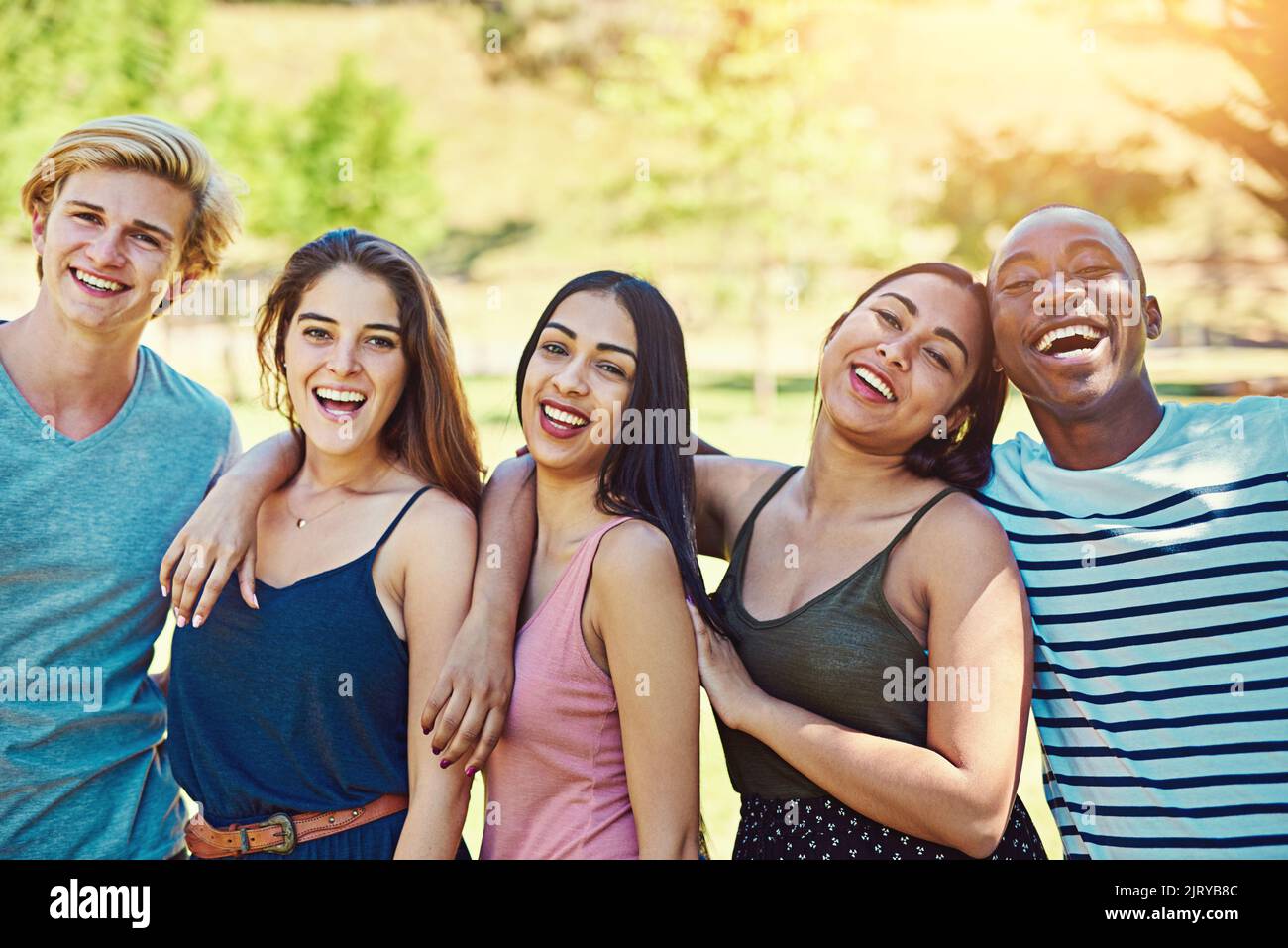 Bring on the blissful summer times. Portrait of a group of young ...